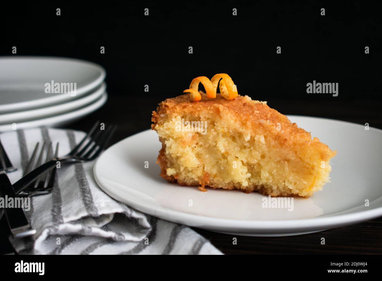 Greek Revani (Ravani) with Garnish: A slice of orange-coconut cake ...