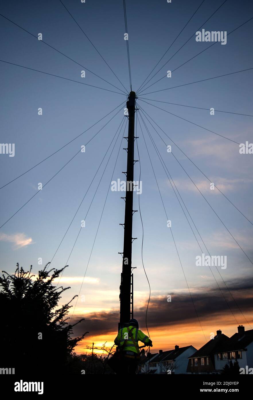 Worker Climbing Utility Pole High Resolution Stock Photography and ...