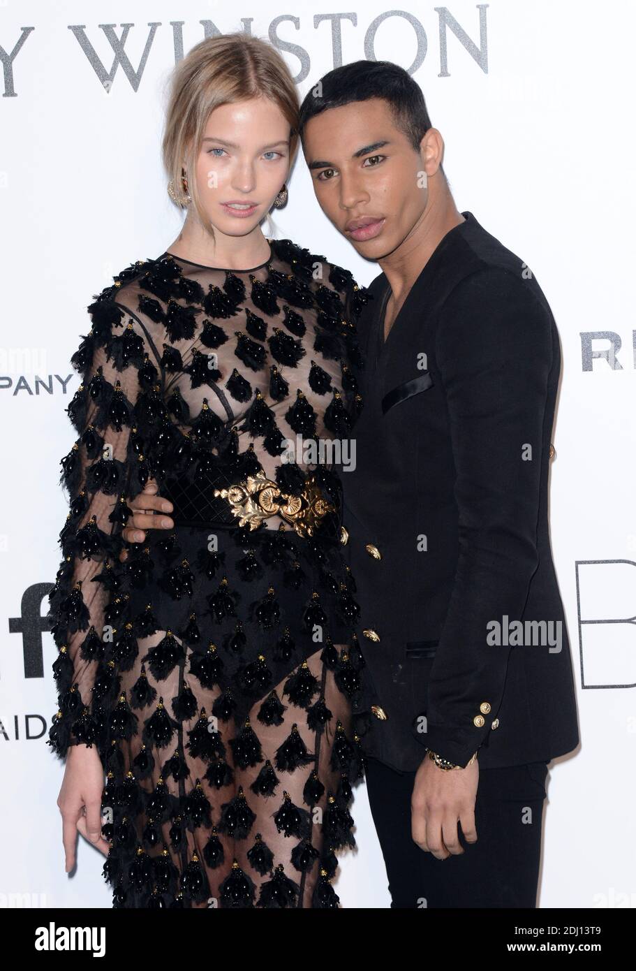 Stylist Olivier Rousteing and model Sasha Luss attending amfAR's 23rd ...