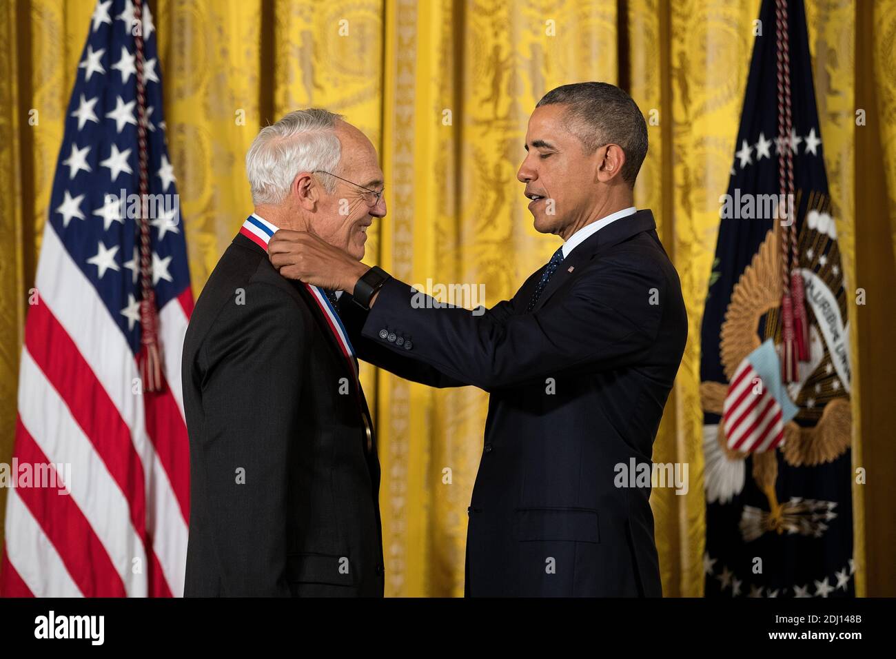L-R Dr. Arthur Gossard, from University of California, receives the ...