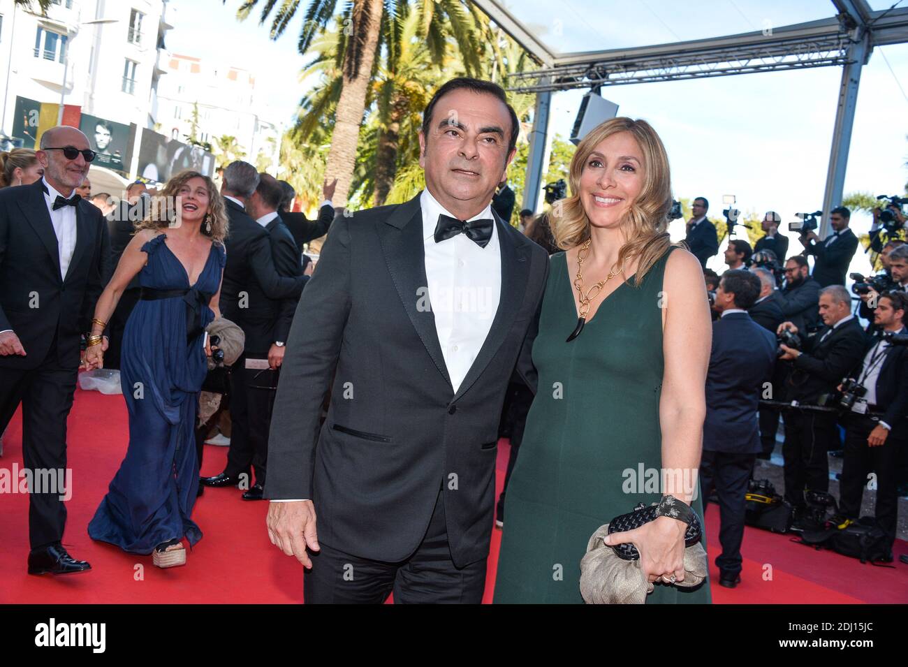 Carlos Ghosn and wife attending the The Last Face screening at the ...