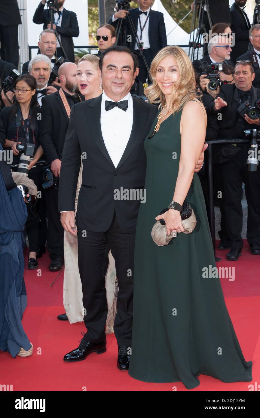 Carlos Ghosn and his wife arriving on the red carpet of 'The last face ...