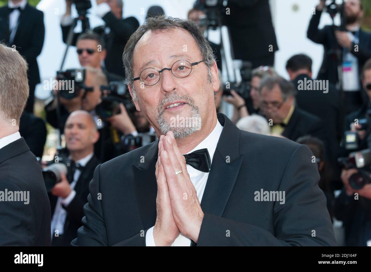 Jean Reno arriving on the red carpet of 'The last face' screening held ...