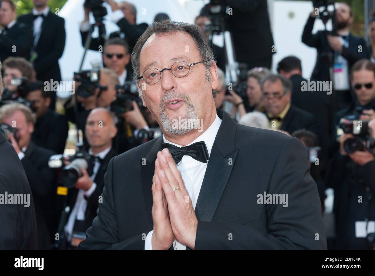 Jean Reno arriving on the red carpet of 'The last face' screening held ...