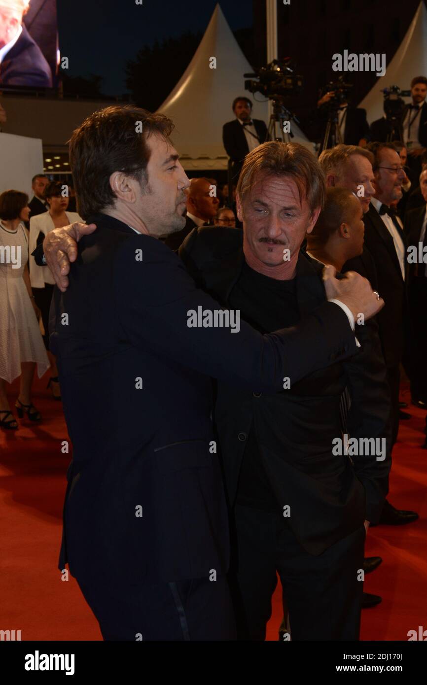 Sean Penn and Javier Bardem hug each other after the screening of The ...