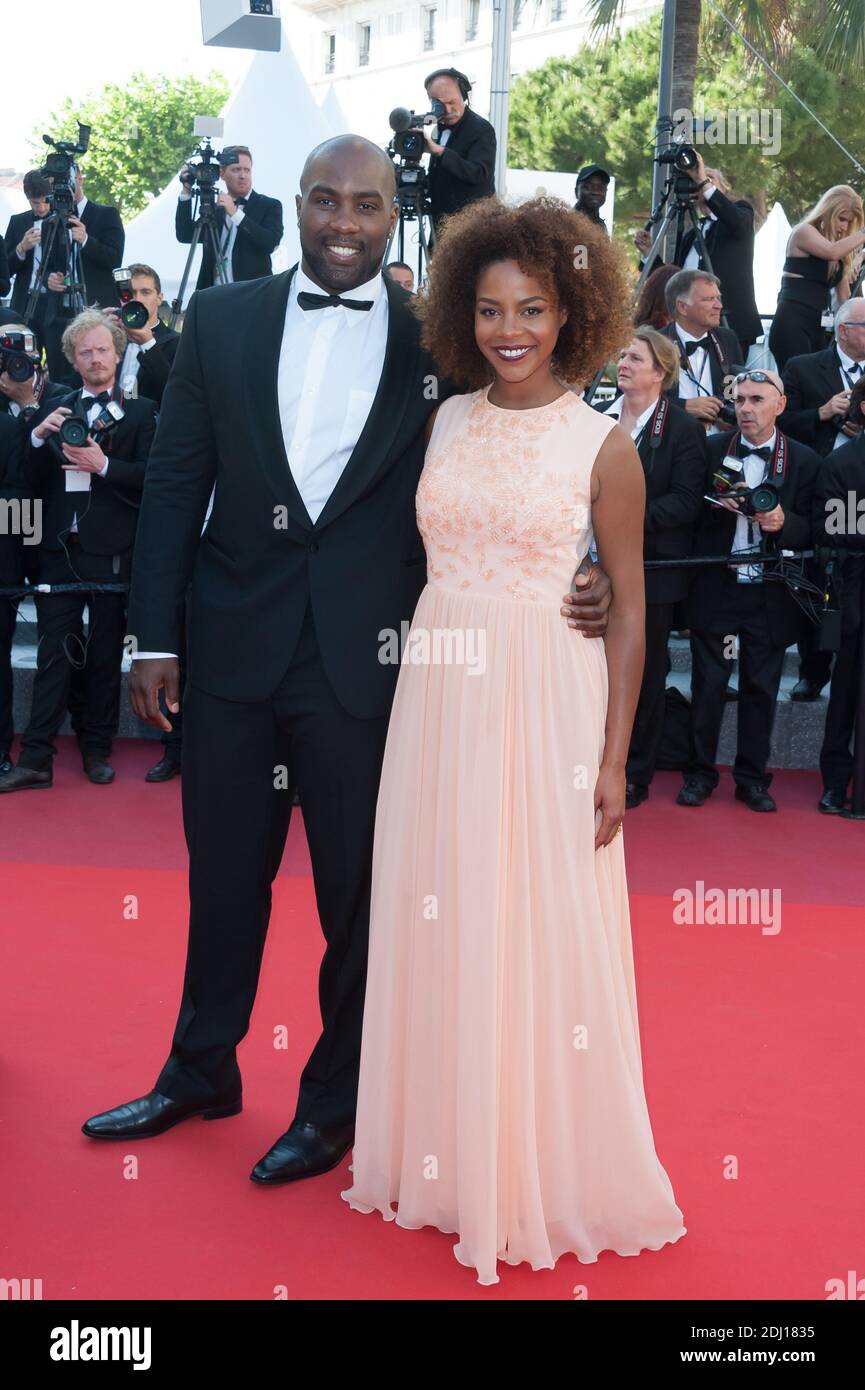Teddy Riner and his partner Luthna arriving on the red carpet of 'Elle ...