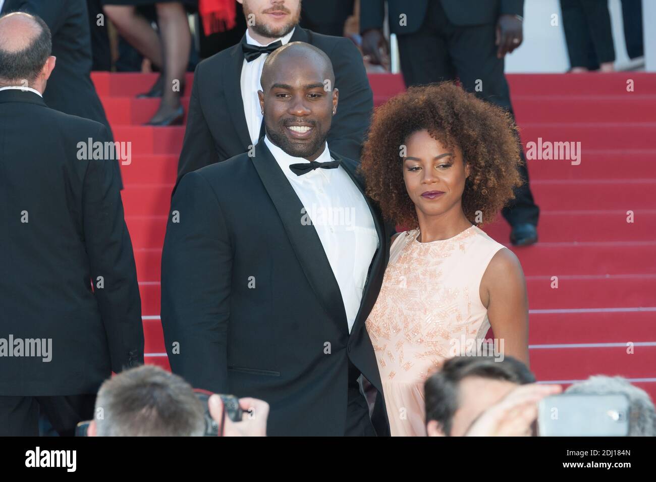 Teddy Riner and his partner Luthna arriving on the red carpet of 'Elle ...