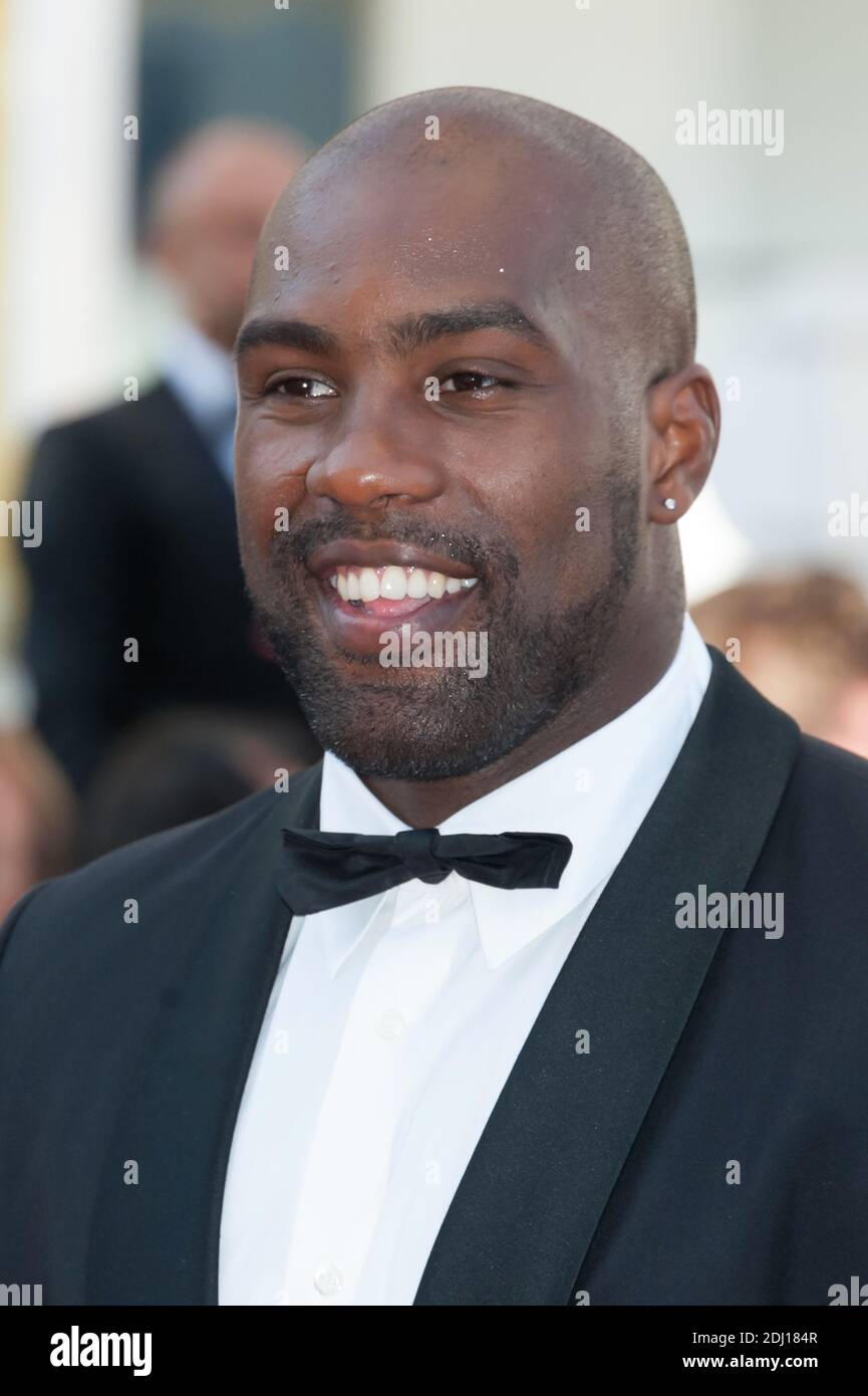 Teddy Riner arriving on the red carpet of 'Elle' screening held at the ...