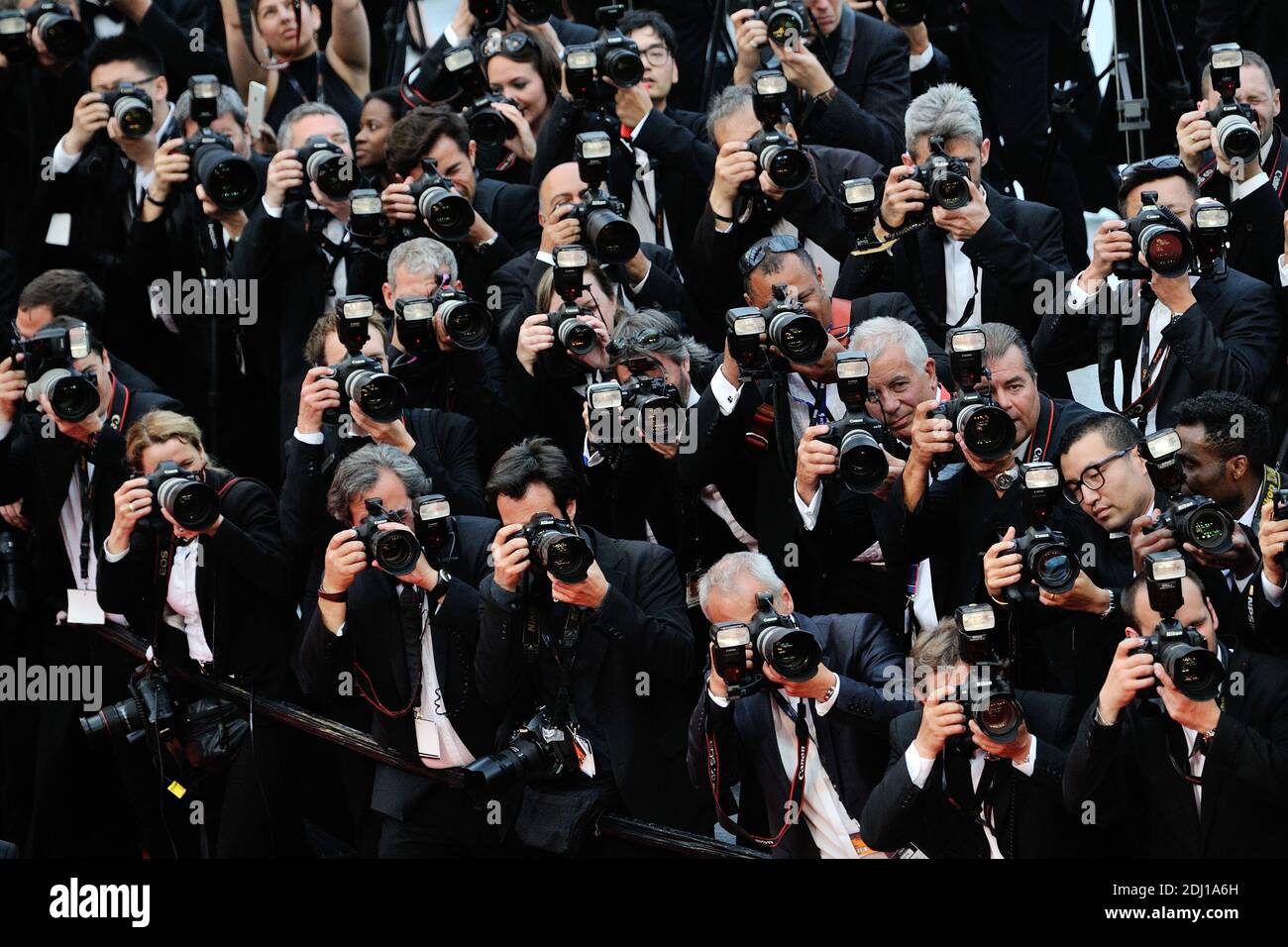 Photographers shooting during the Closing Ceremony Red Carpet at the ...