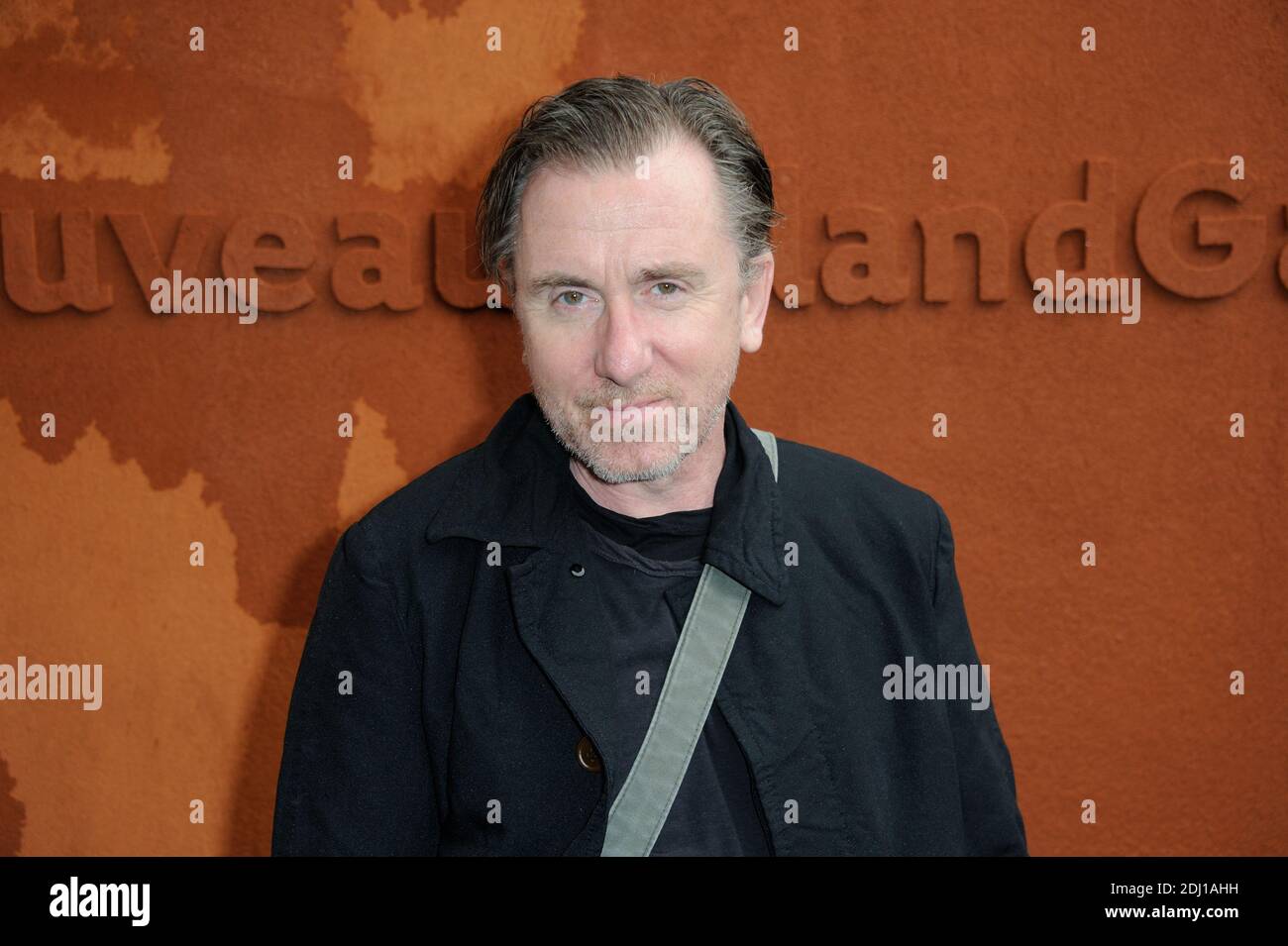 Tim Roth posing at the Village during French Tennis Open at Roland ...