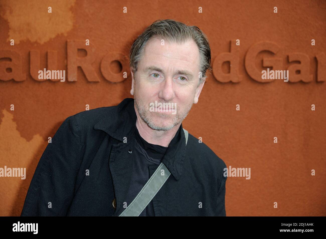 Tim Roth posing at the Village during French Tennis Open at Roland ...