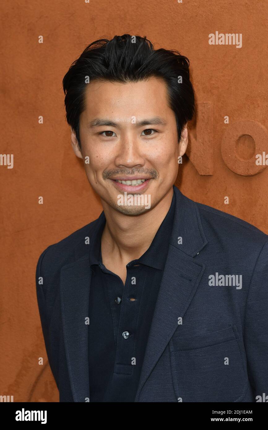 Frederic Chau posing at the Village during French Tennis Open at Roland ...