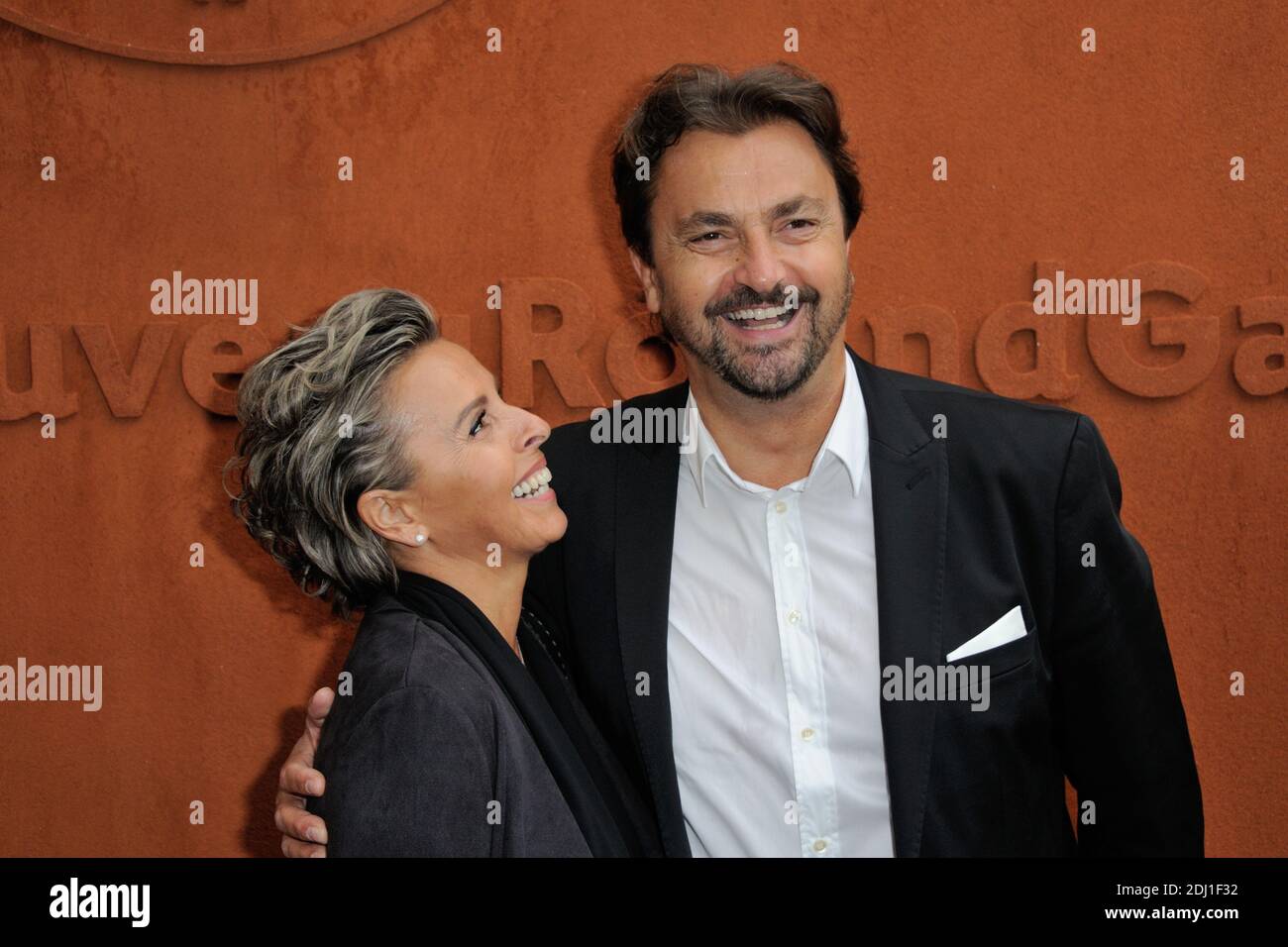 Henri Leconte and Maria Dowlatshahi posing at the Village during French ...