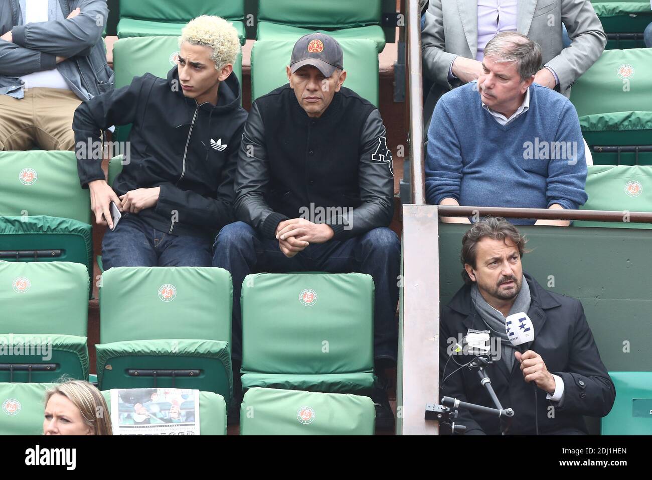 Roschdy Zem with his son Chad and Henri Leconte in the VIP Tribune ...