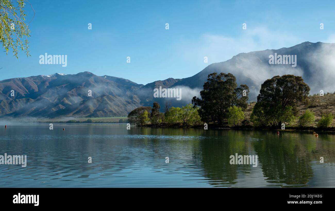 Lake Benmore in the mist, Canterbury, New Zealand Stock Photo - Alamy