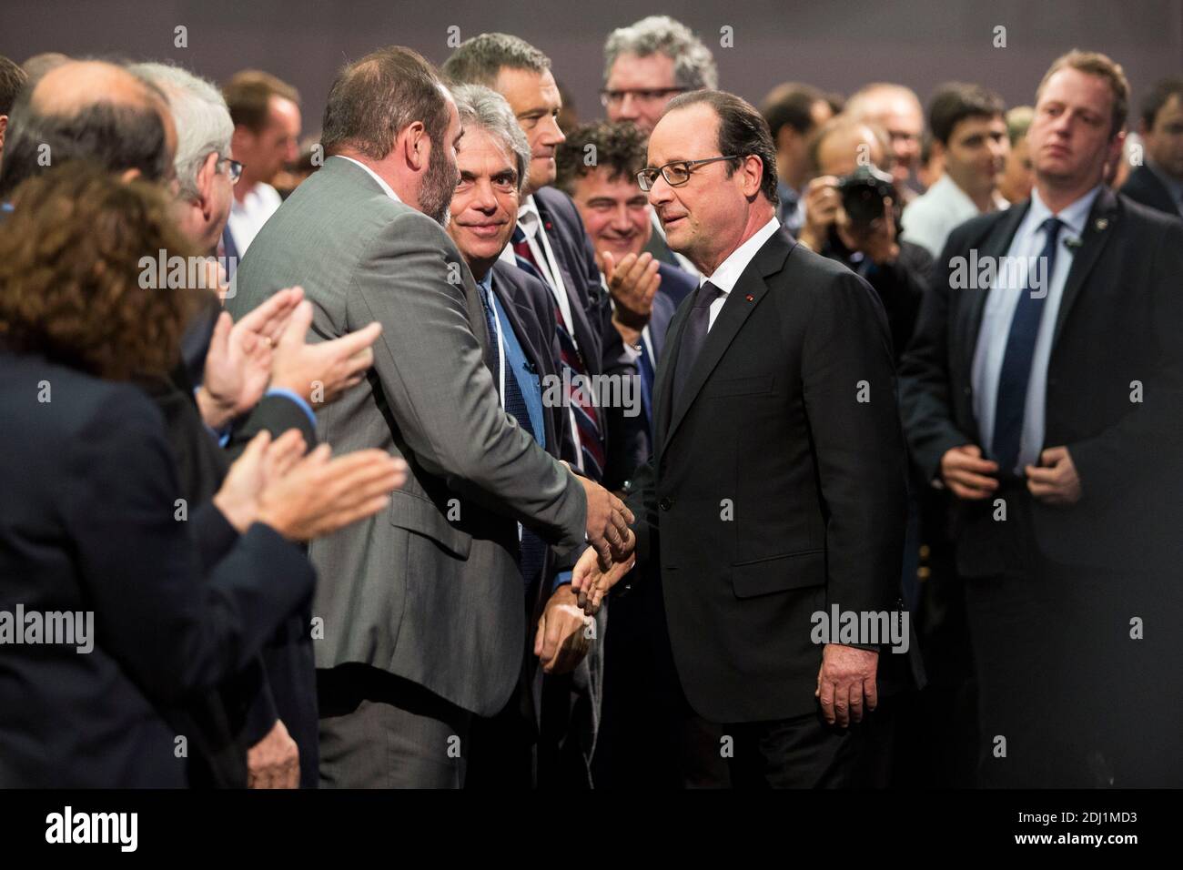 French President Francois Hollande is cheered by delegates during the ...