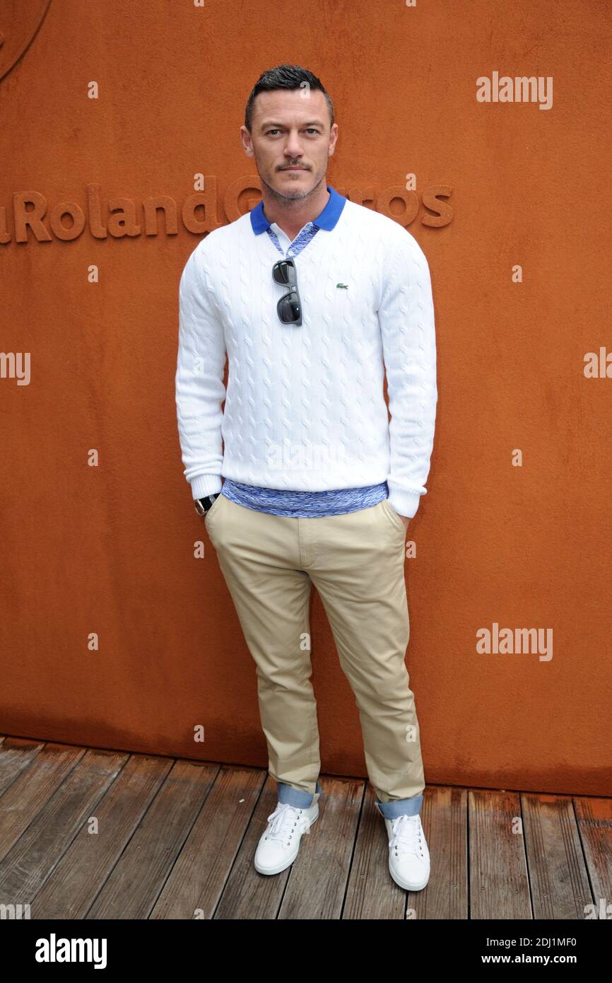 Luke Evans posing at the Village during French Tennis Open at Roland ...