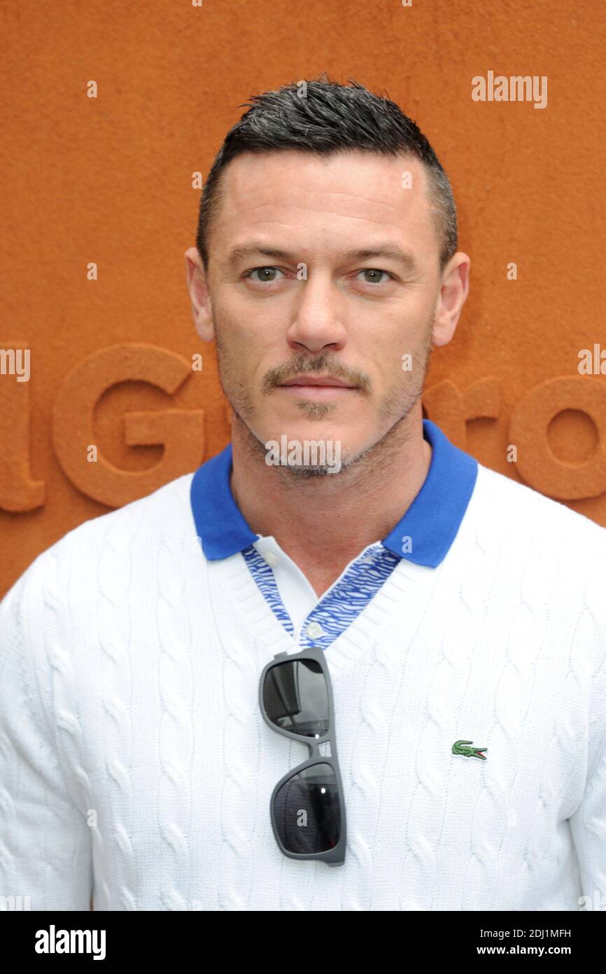 Luke Evans posing at the Village during French Tennis Open at Roland ...