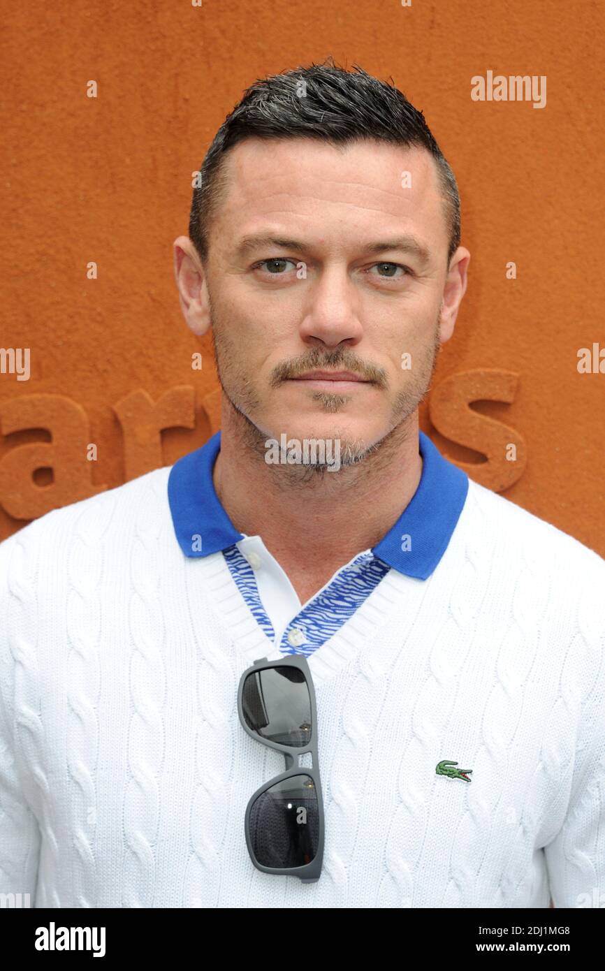 Luke Evans posing at the Village during French Tennis Open at Roland ...