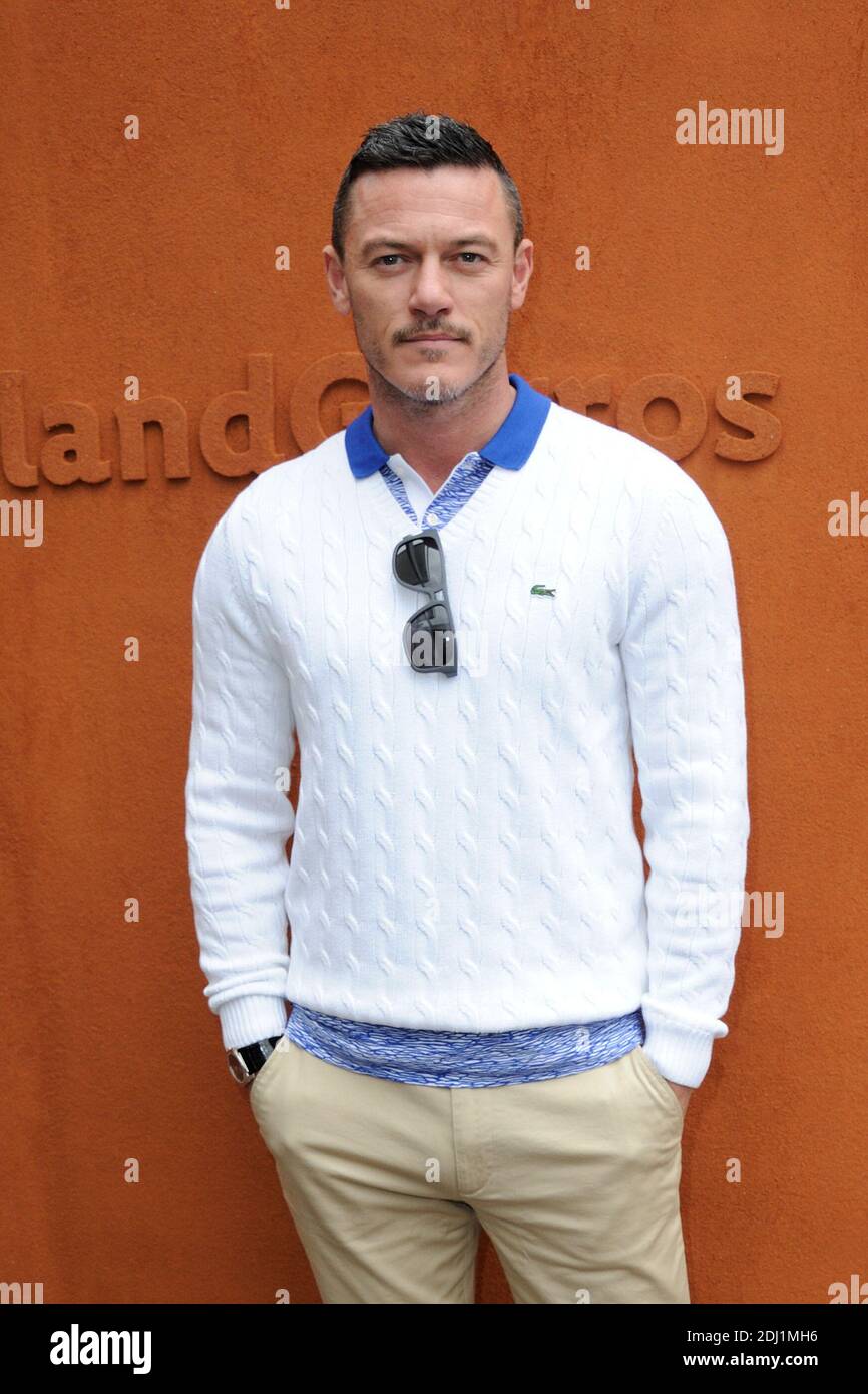 Luke Evans posing at the Village during French Tennis Open at Roland ...