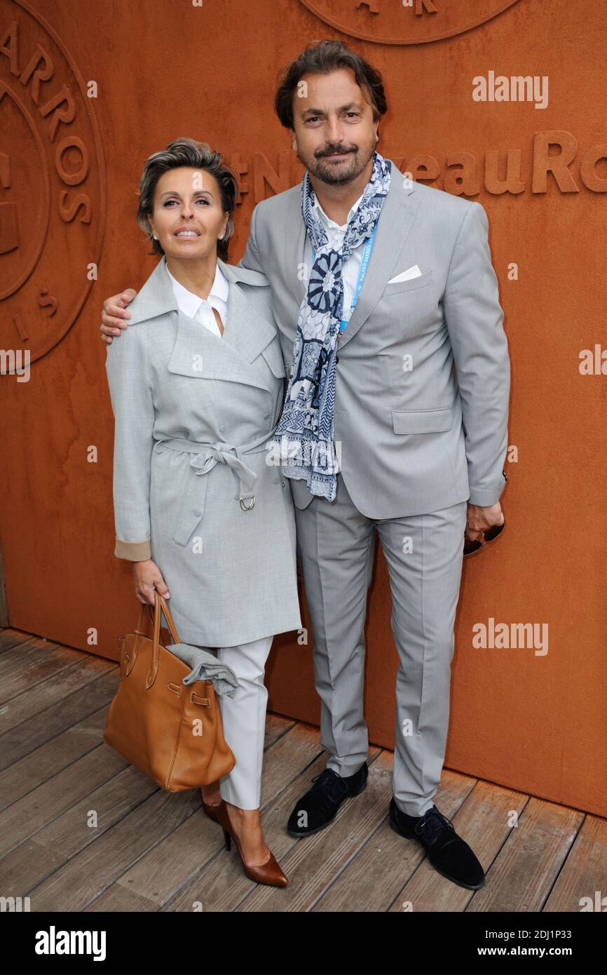 Maria Dowlatshahi, Henri Leconte posing at the Village during French ...