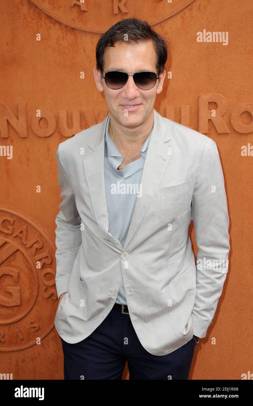 Clive Owen posing at the Village during French Tennis Open at Roland ...