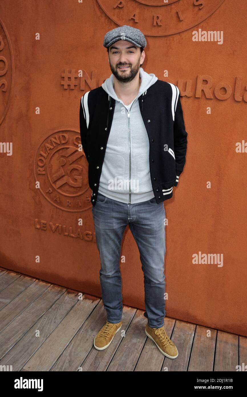 Cyril Lignac posing at the Village during French Tennis Open at Roland ...