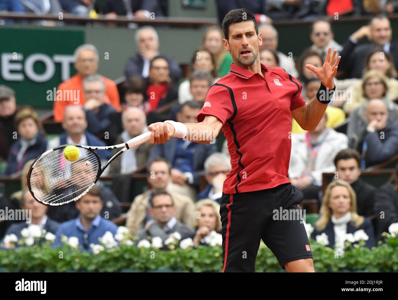 FRANCE, Paris : Serbia's Novak Djokovic returns the ball to Great ...