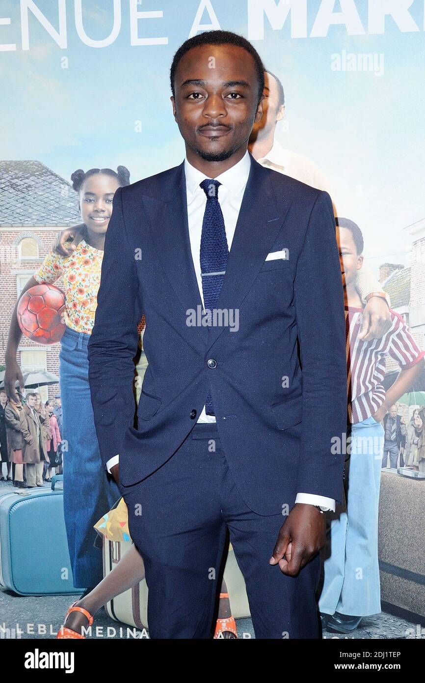 Marc Zinga assiste a l'avant-premiere du film 'Bienvenue a Marly ...