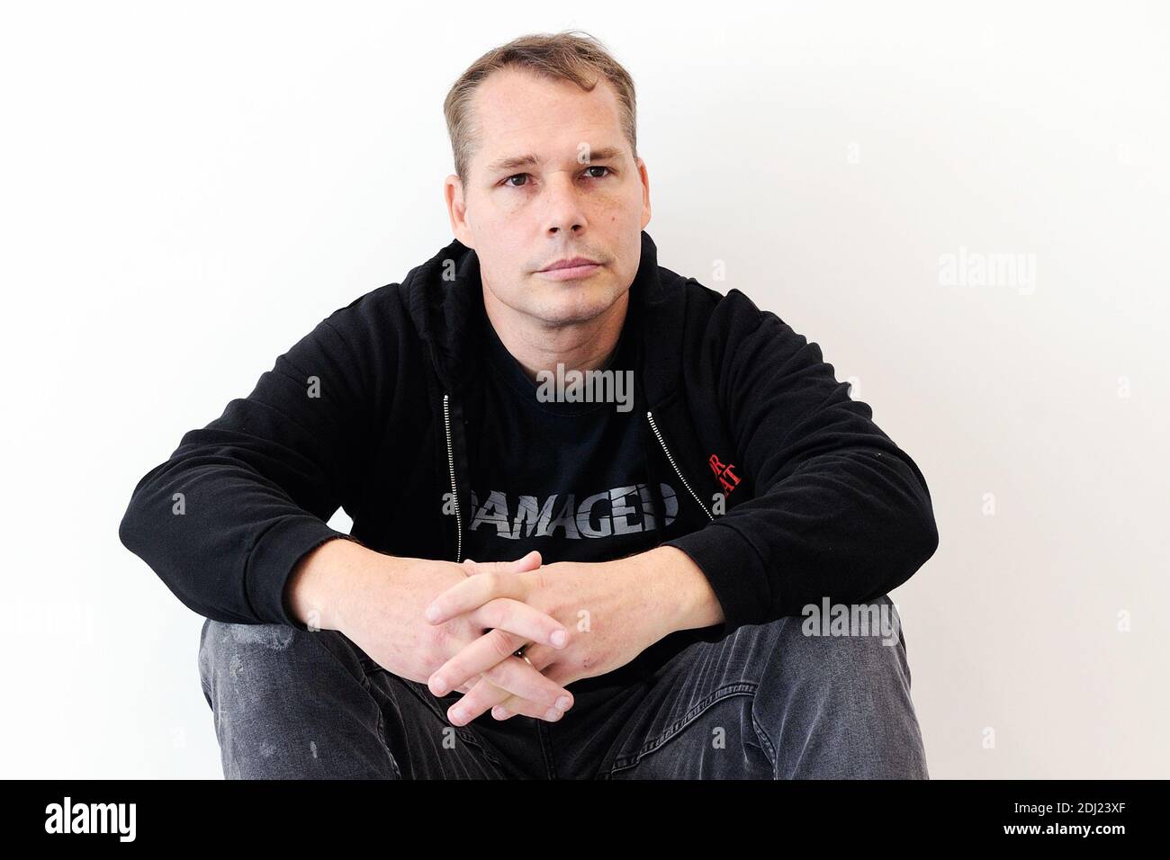 Streetartist OBEY (Shepard Fairey) posing before installing his new ...
