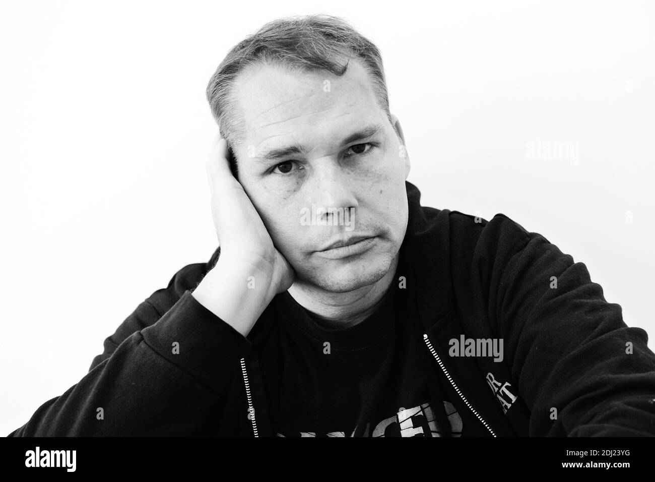 Streetartist OBEY (Shepard Fairey) posing before installing his new ...