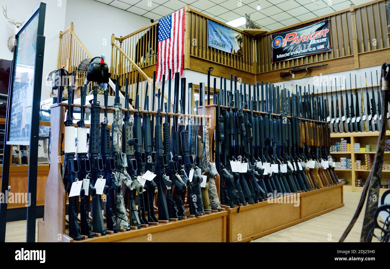 Assault rifles are on display in the shop of a hunting and weapons ...
