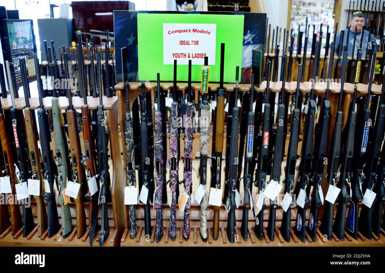 Rifles are on display in the shop of a hunting and weapons store on ...
