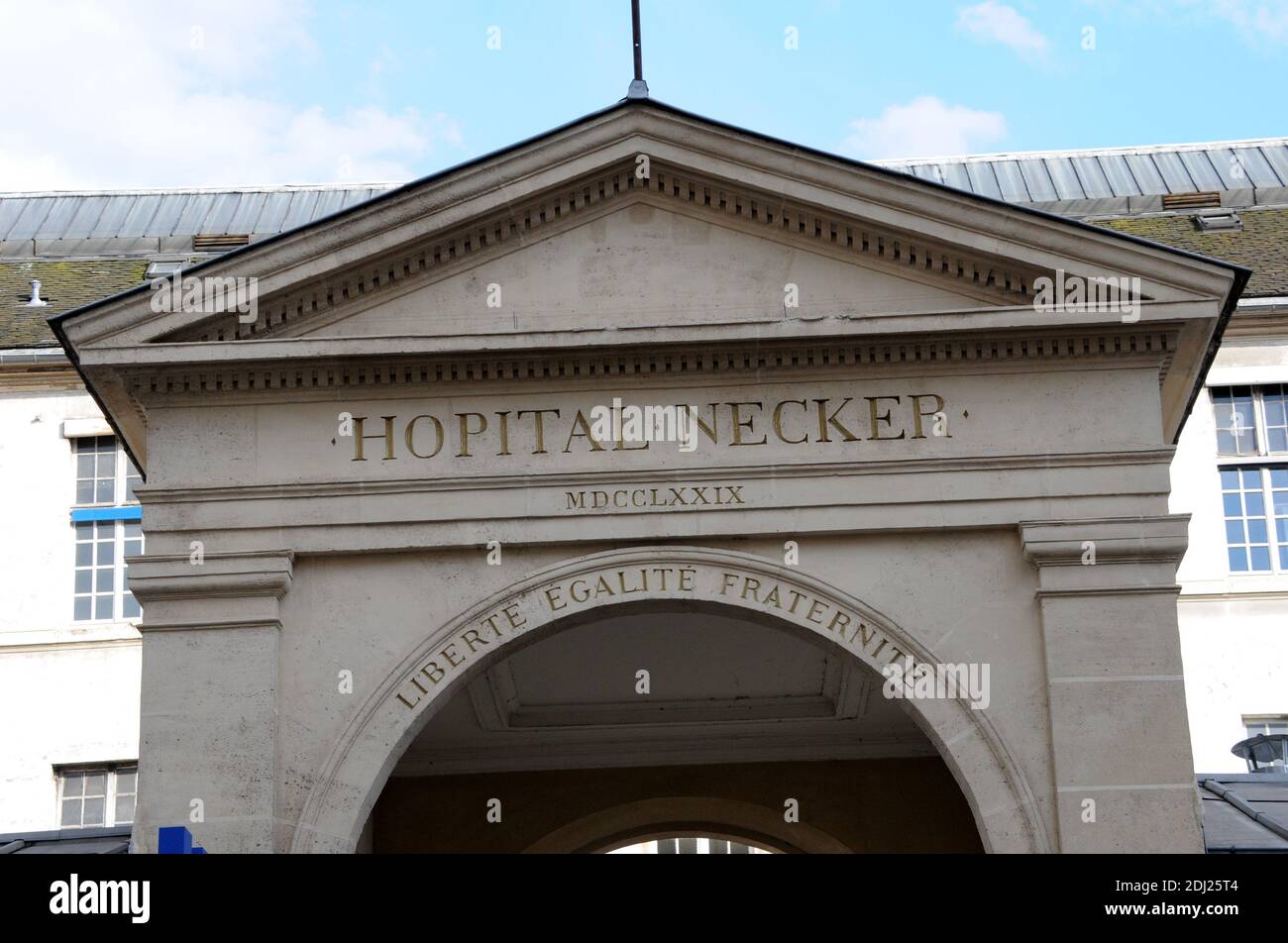 Damage and graffitis on the facade Necker Hospital in Paris, France on ...