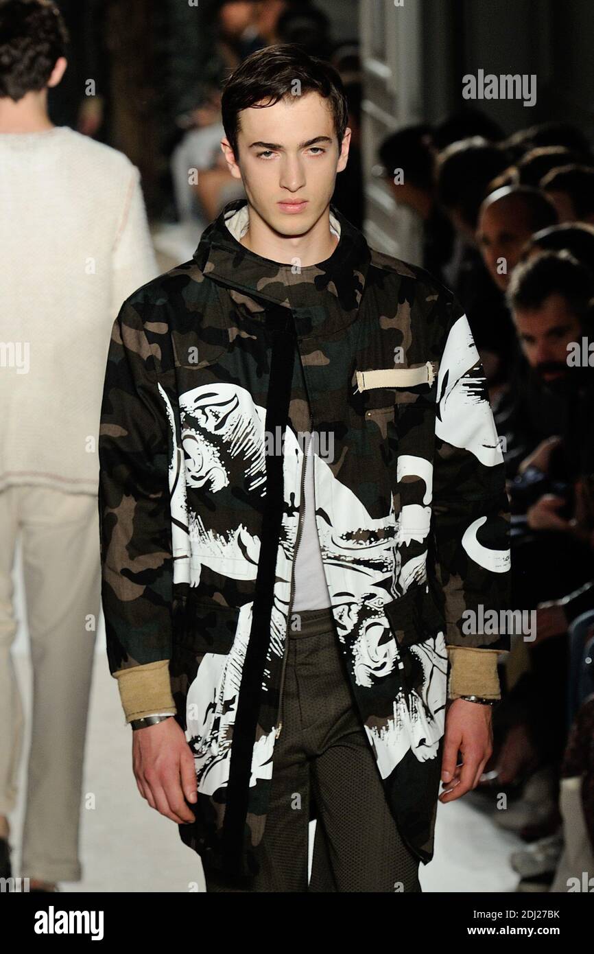 A model walks the runway at the Valentino show during Paris Men's ...