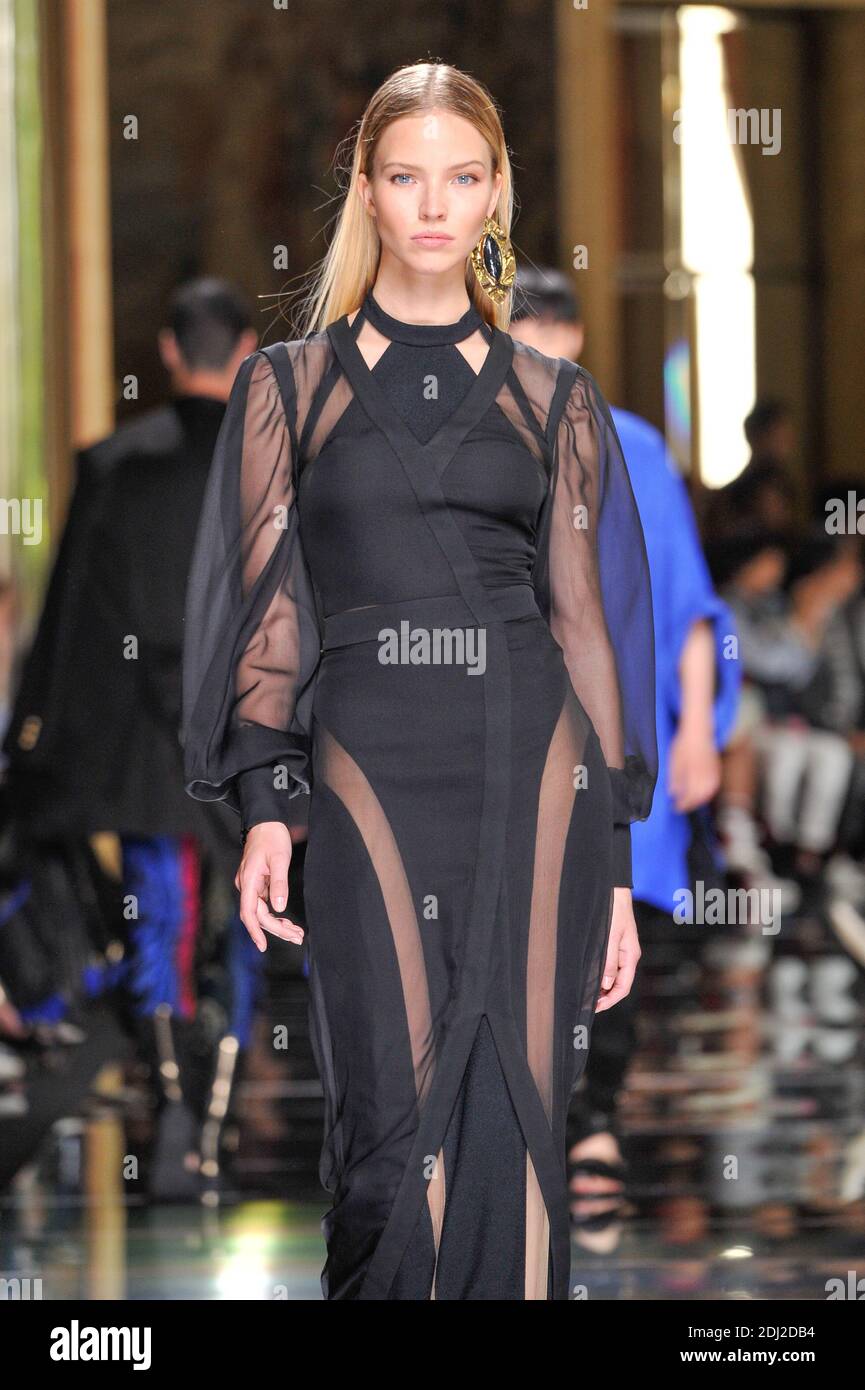 Sasha Luss walks the runway during the Balmain Menswear Spring/Summer ...