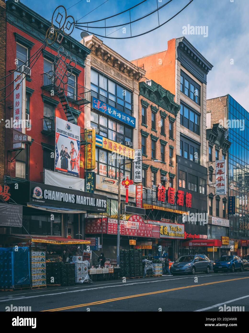 Signs and buildings on East Broadway in Chinatown, Manhattan, New York ...