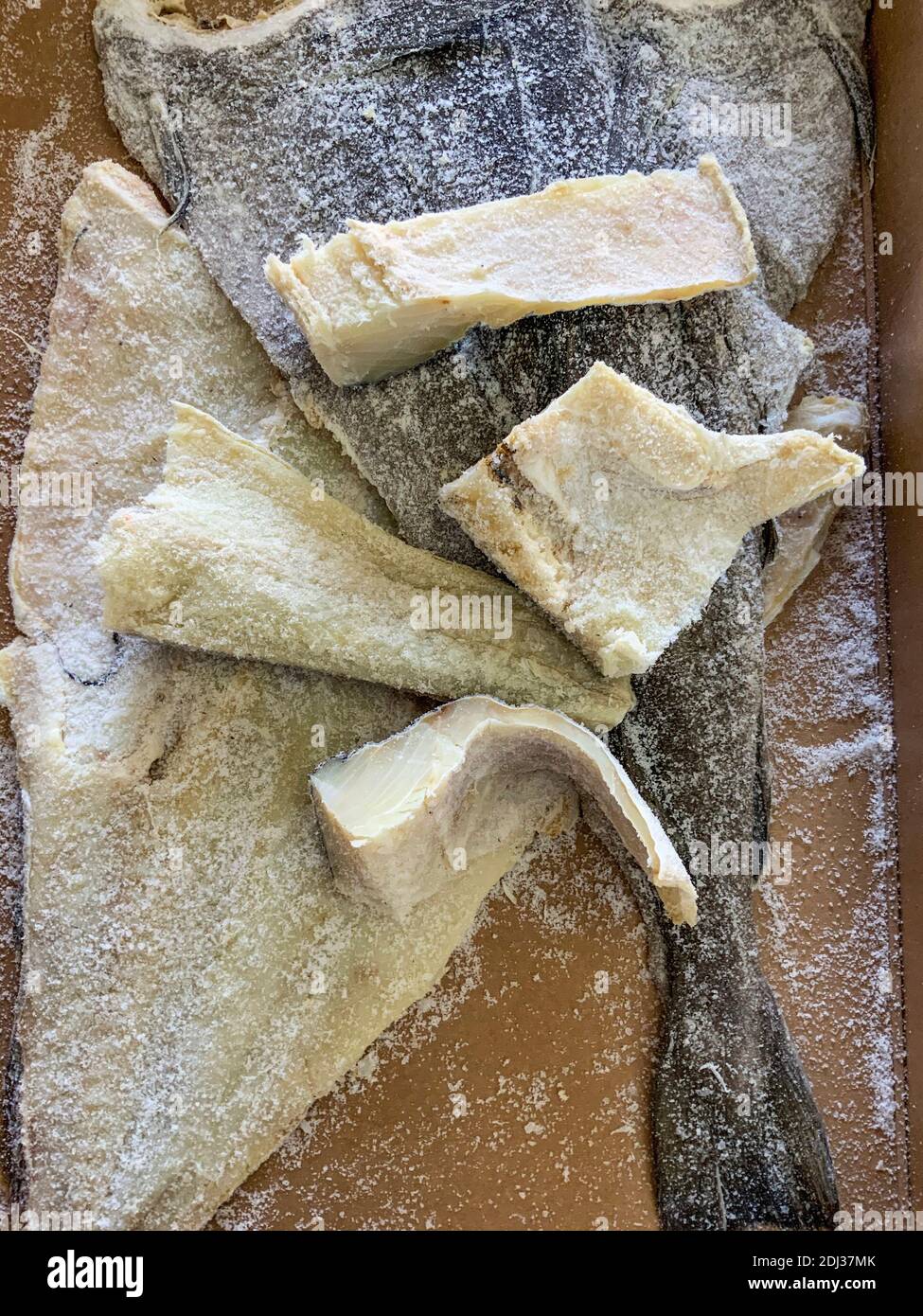 Dried and salted cod fish cut into portions Stock Photo - Alamy