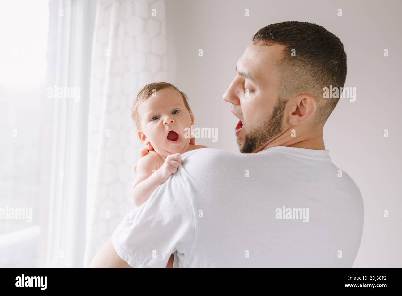 Child imitating parent hi-res stock photography and images - Alamy