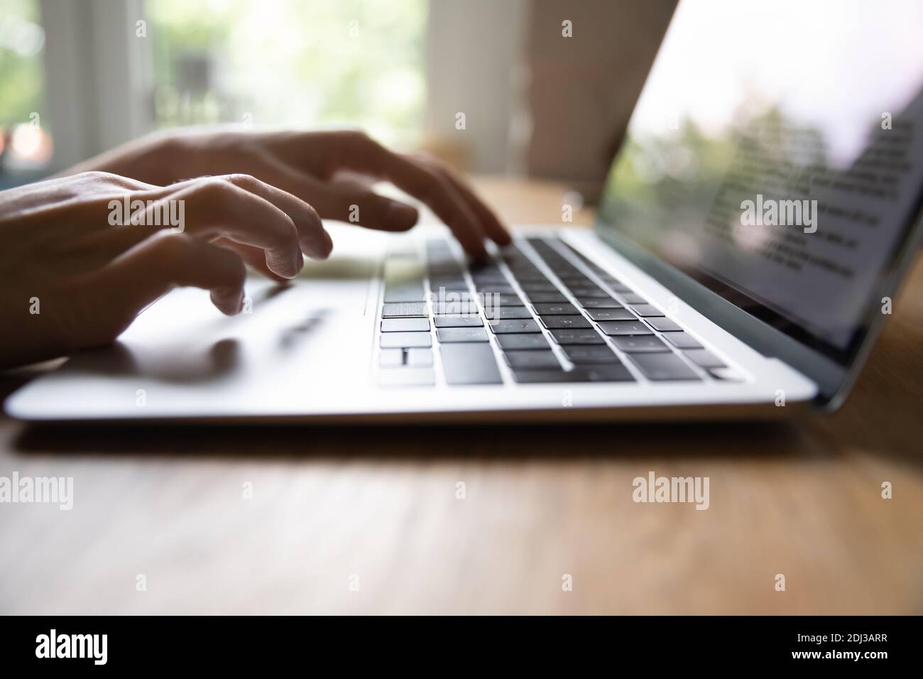 Close up female hands typing on laptop keyboard, working online Stock ...
