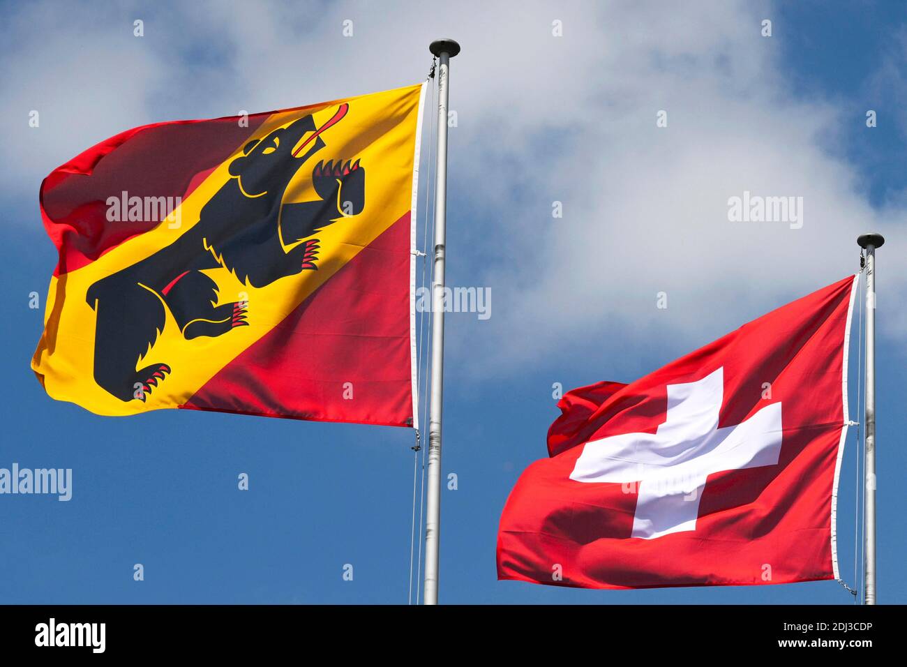 Flags of the city and canton of Bern and Swiss flag in the wind ...