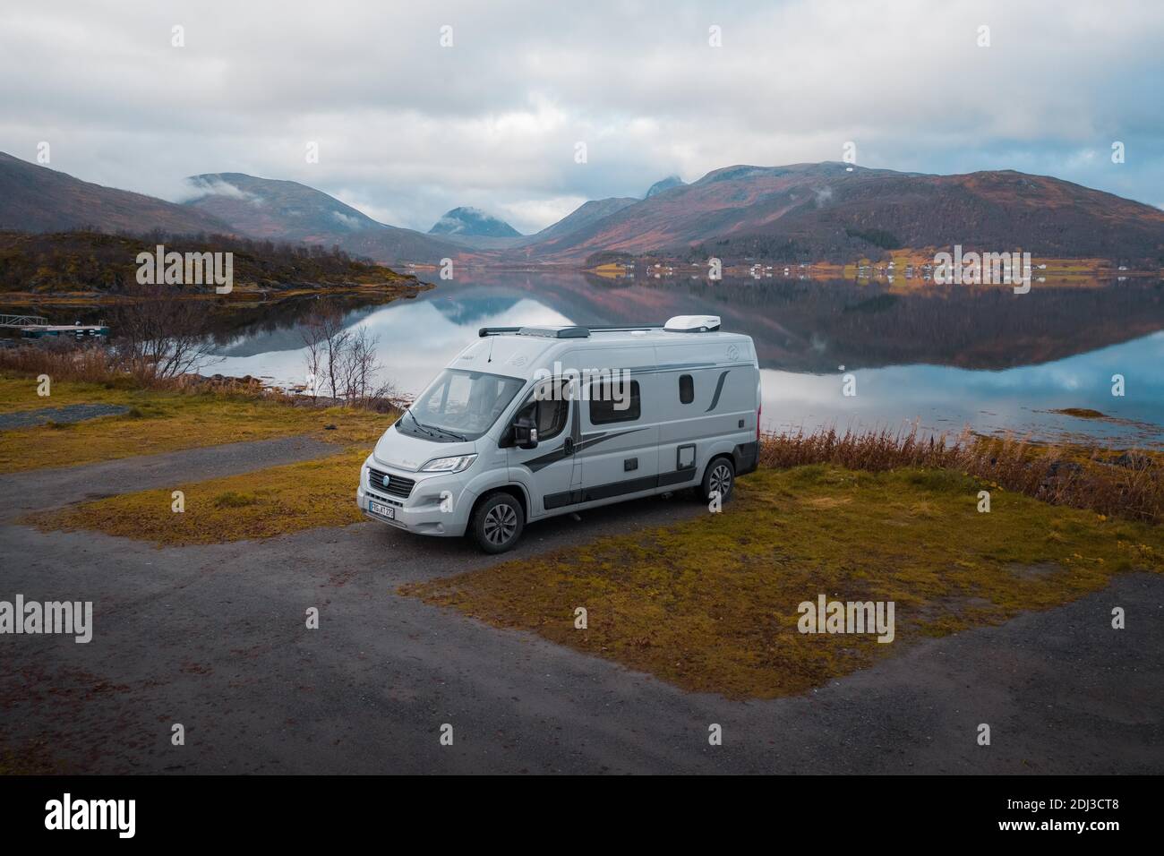 Campervan parked in the parking lot at Fjordbotn Camping, Senja, Norway ...