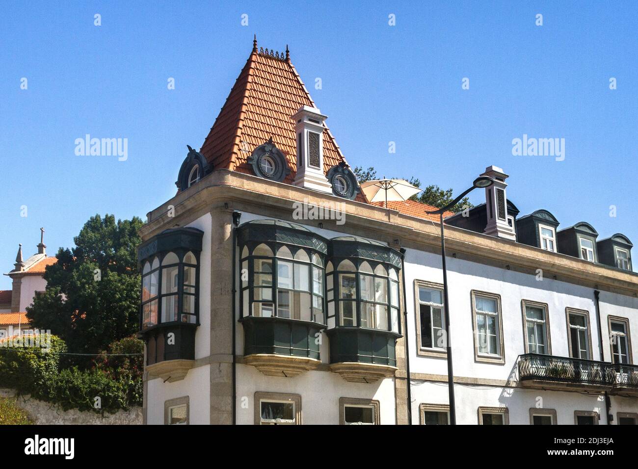 Traditional corner house on a street in Porto Stock Photo - Alamy