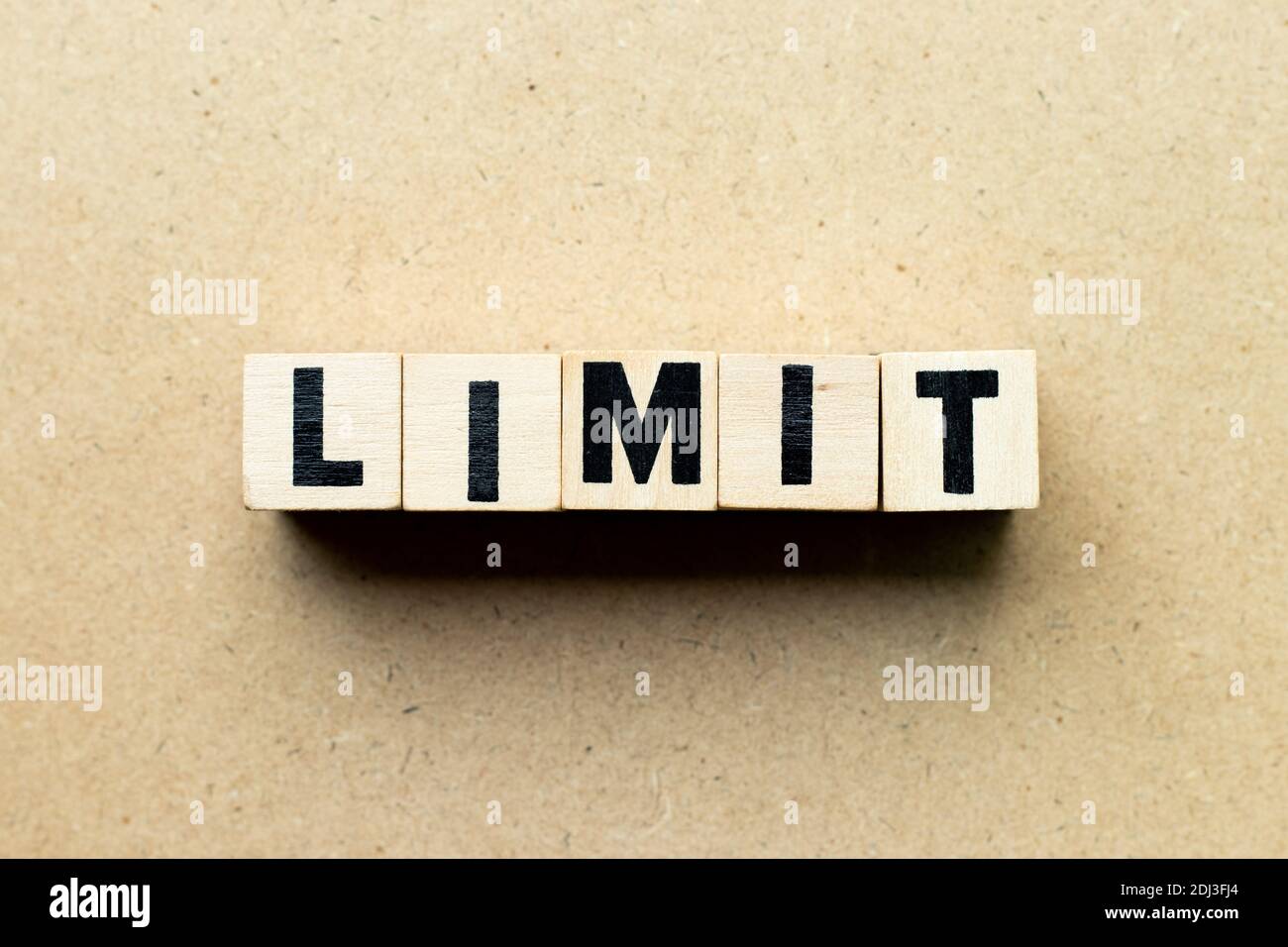 Letter block in word limit on wood background Stock Photo - Alamy