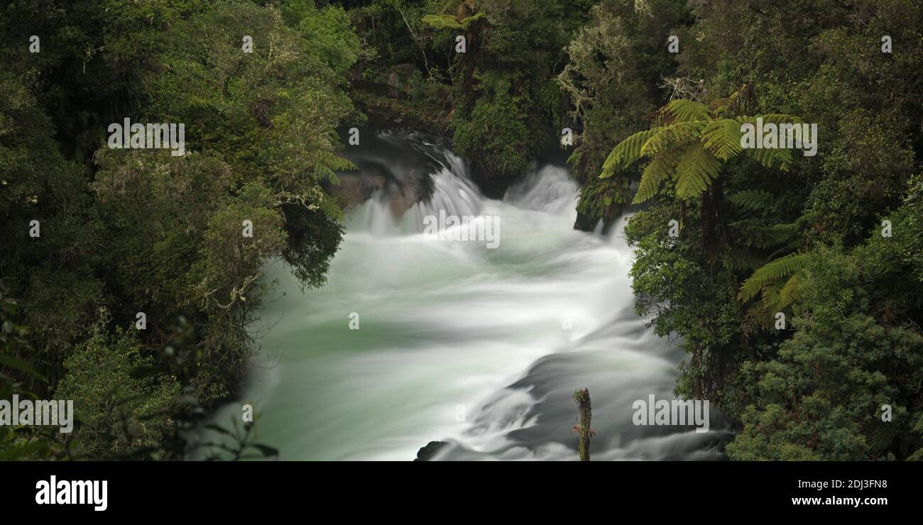 Waterfall on a river running through forest near Rotorua in New Zealand ...