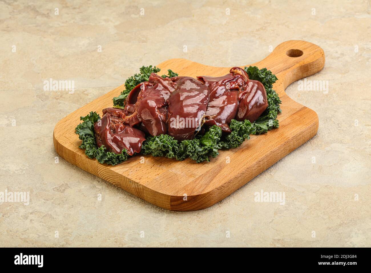 Raw chicken liver over board for cooking Stock Photo - Alamy