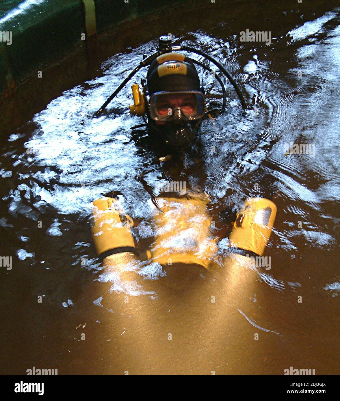 Diver in the pool with special search equipment Stock Photo - Alamy