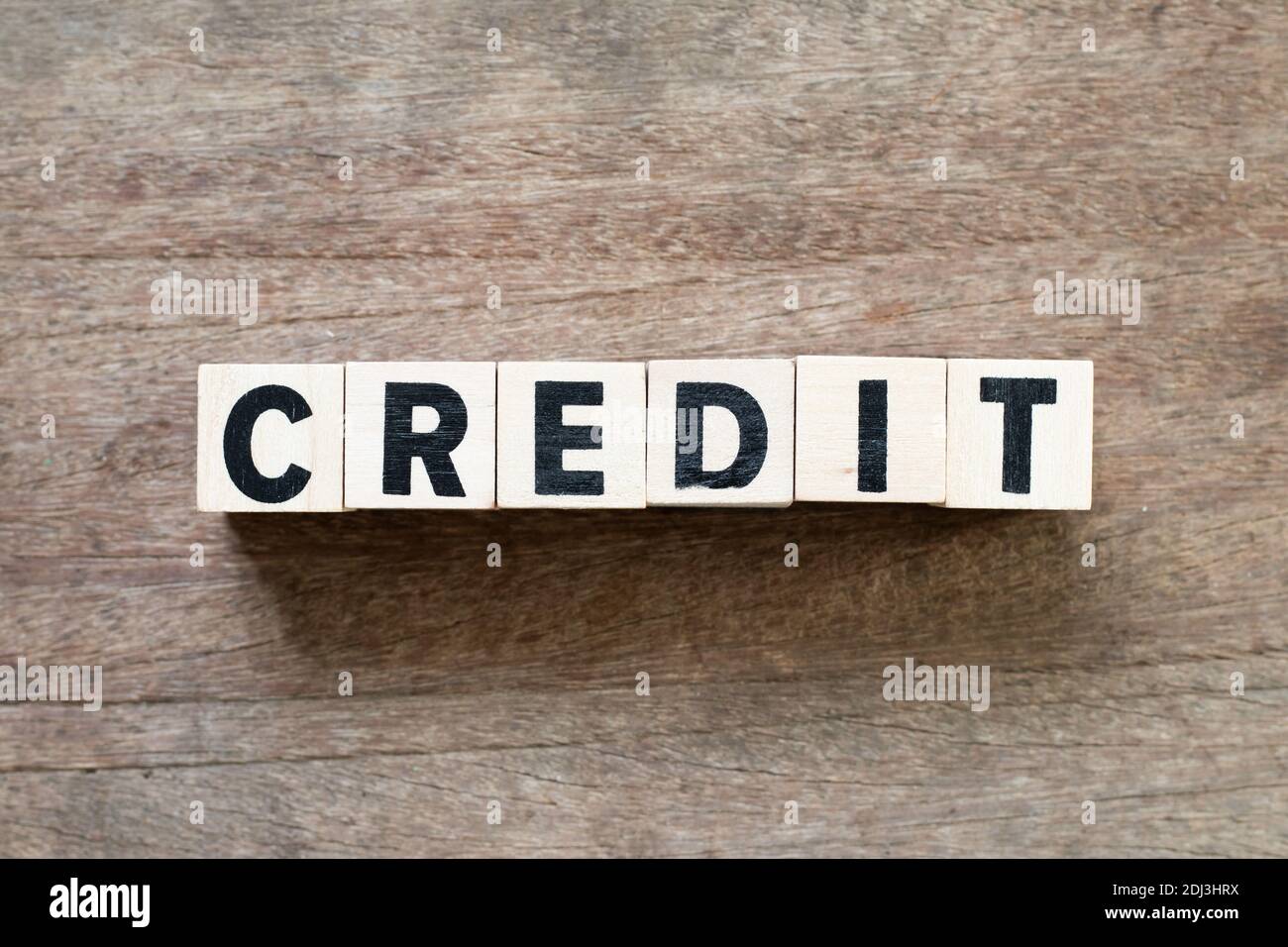 Alphabet letter block in word credit on wood background Stock Photo - Alamy