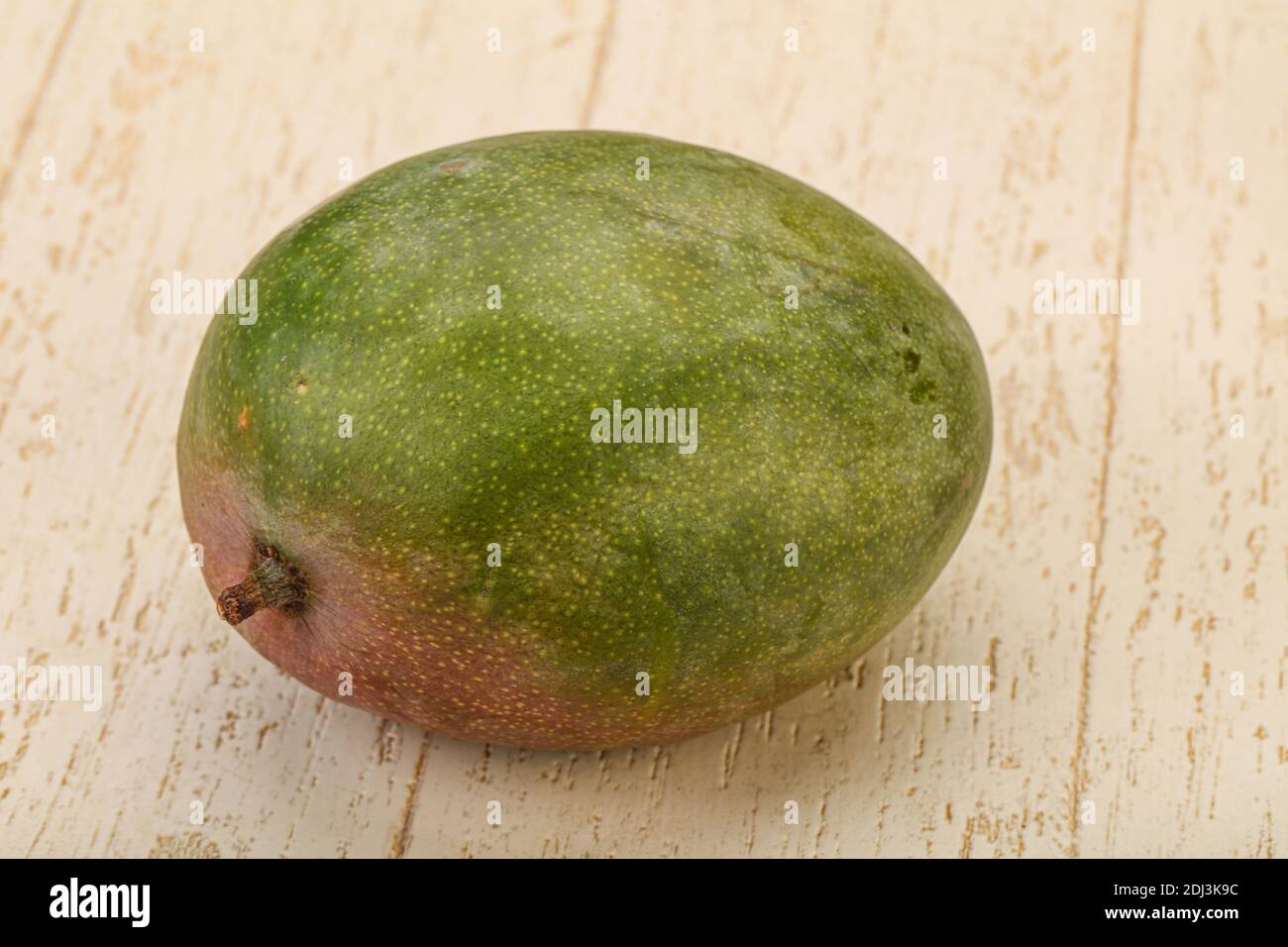 Tropical fruit - Green sweet tasty mango Stock Photo - Alamy