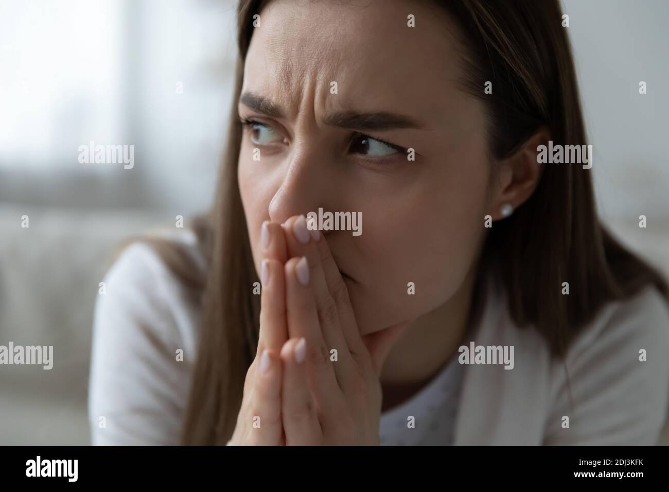 Close up frustrated thoughtful young woman thinking about problems ...